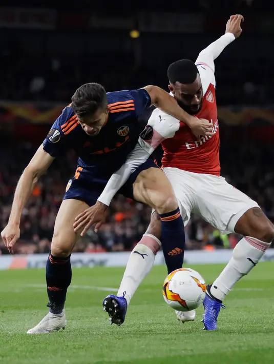 FOTO: Arsenal Atasi Valencia di Emirates - Foto Liputan6.com