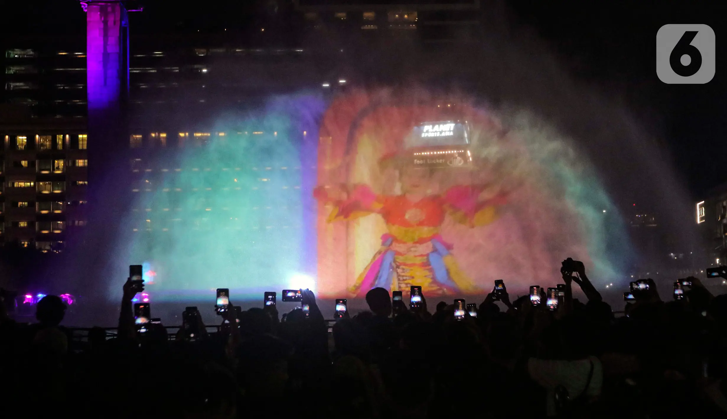 Atraksi Ratusan Drone Meriahkan Malam Pergantian Tahun di Bundaran HI - Foto Liputan6.com