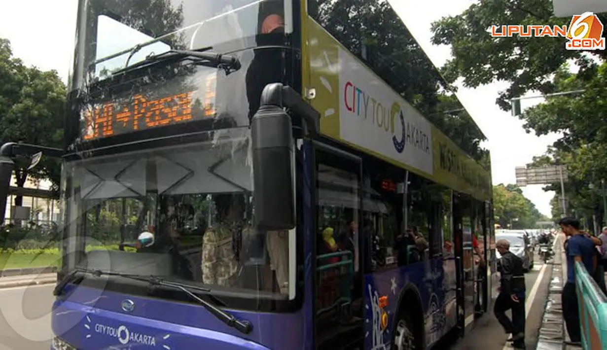 [FOTO] Bus Pariwisata Jakarta Mulai Beroperasi - Foto Liputan6.com
