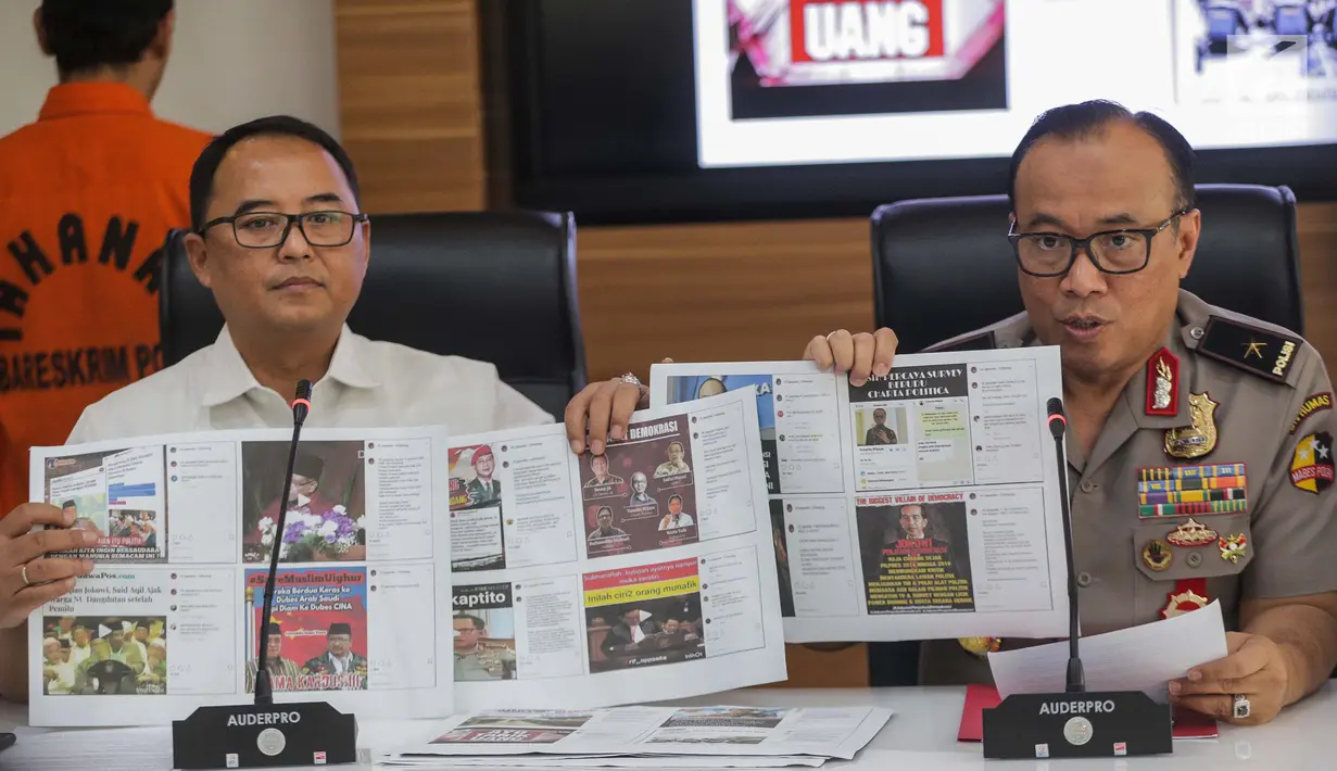 FOTO: Polisi Ungkap Kasus Pemberitaan Hoaks Lewat Medsos - Foto Liputan6.com