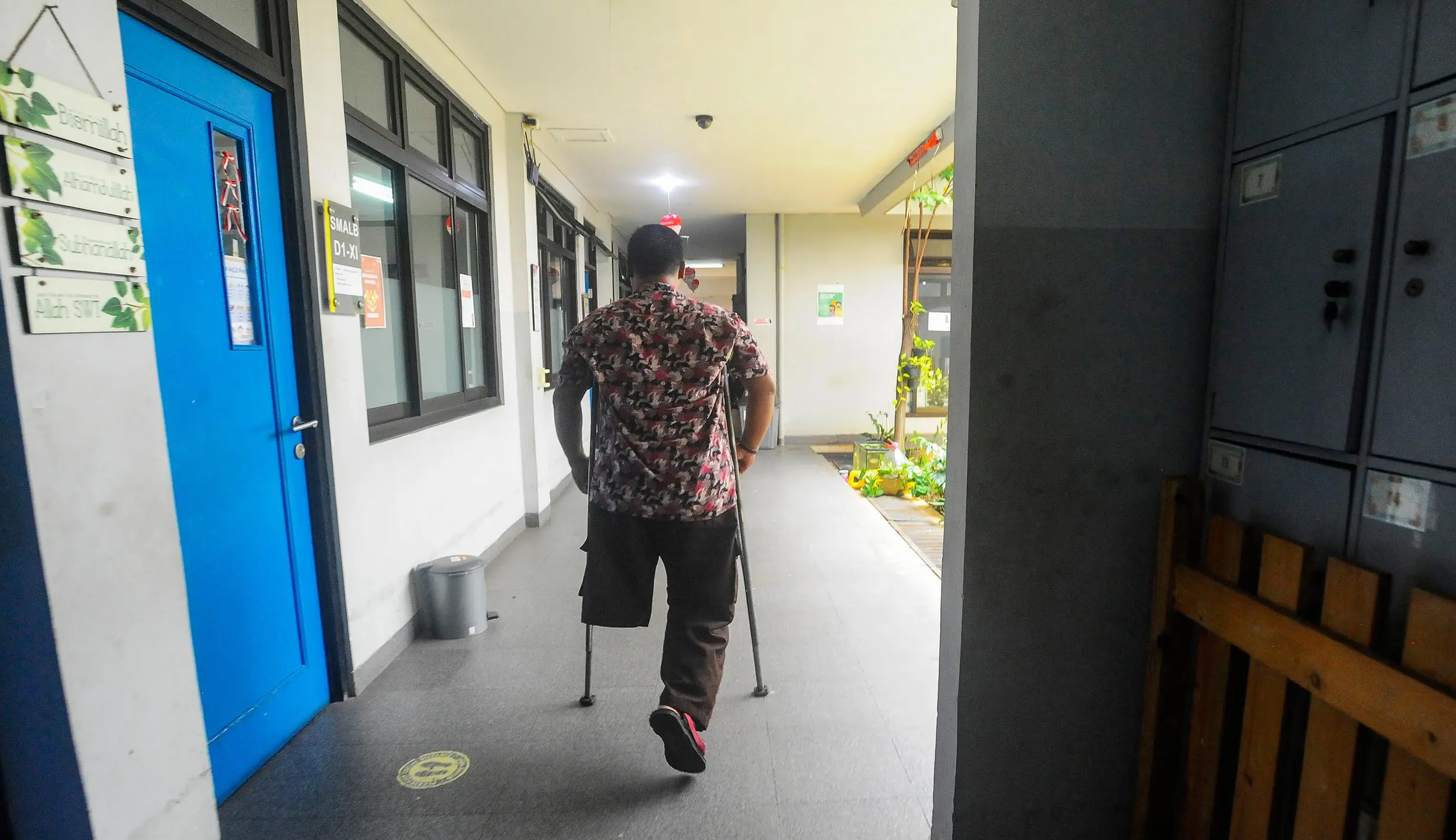 Kisah Pak Agung, Penyandang Disabilitas yang Menjadi Guru Komputer - Foto Liputan6.com