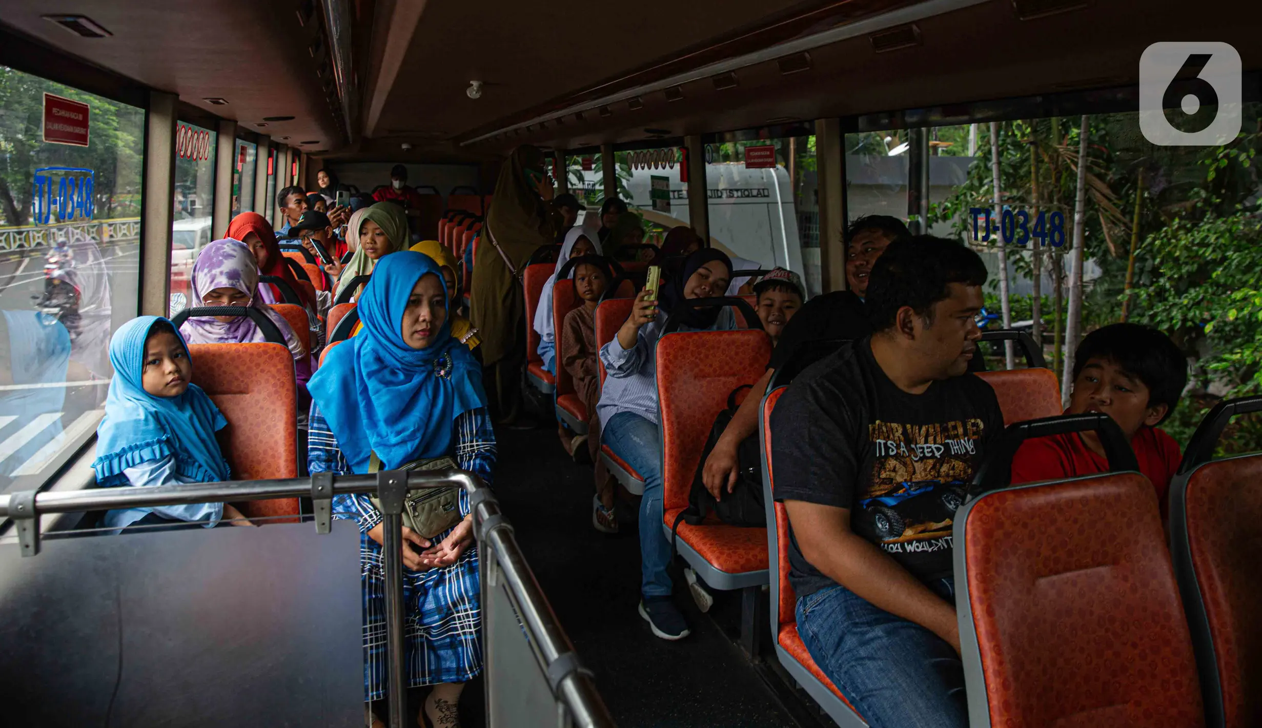 Menikmati Libur Akhir Tahun dengan Bus Wisata Transjakarta - Foto Liputan6.com