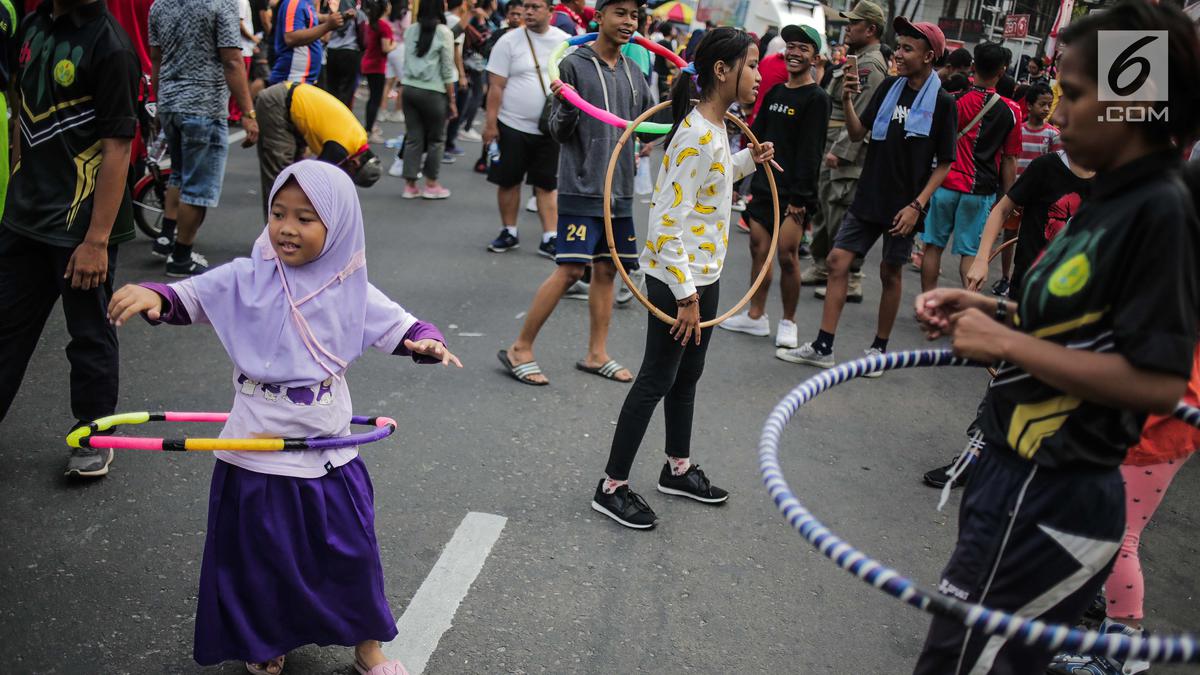 Bermain Hula Hoop Bantu Turunkan Berat Badan dan Perut Kencang - Health ...