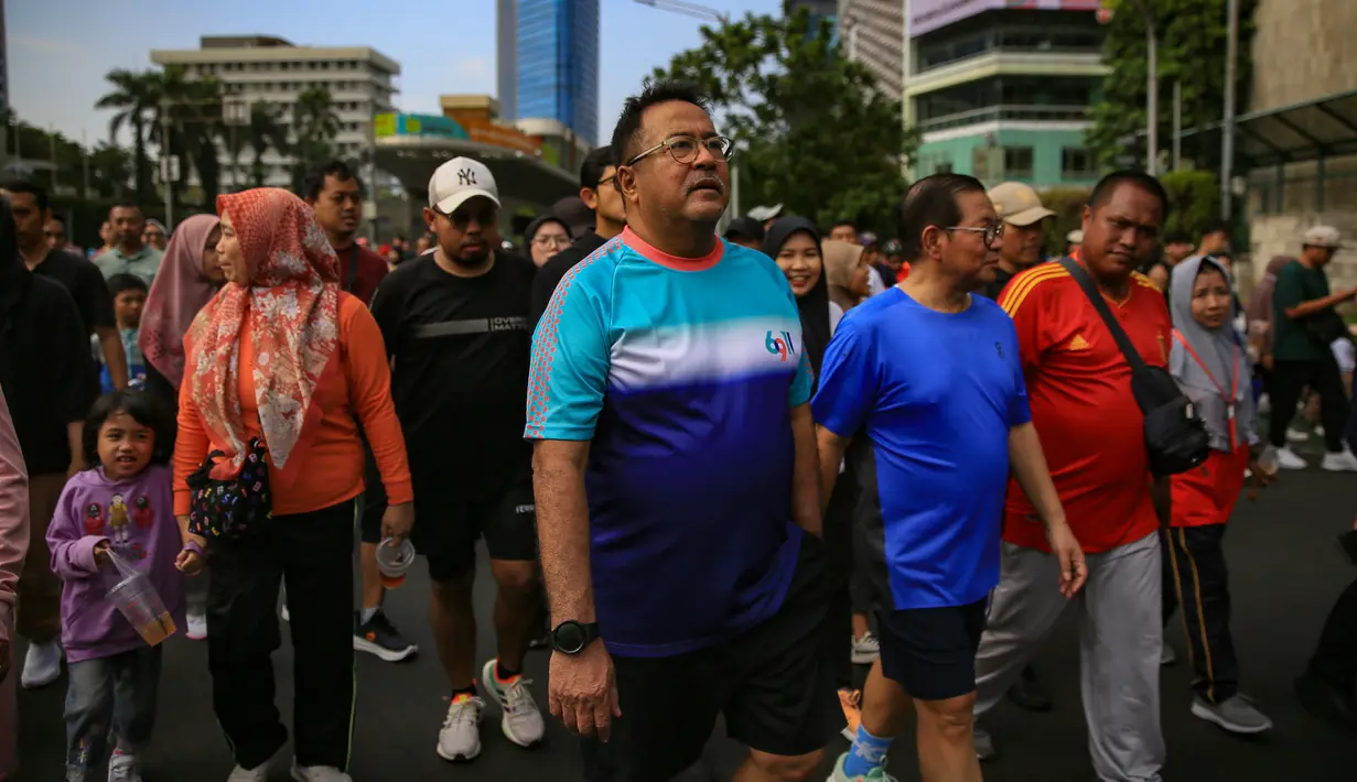 Berolahraga Saat CFD, Pramono Anung-Rano Karno Sapa Warga Jakarta ...