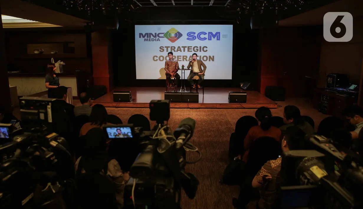 FOTO: Tingkatkan Sektor Bisnis, SCM dan MNC Jalin Kerja Sama - Foto Liputan6.com