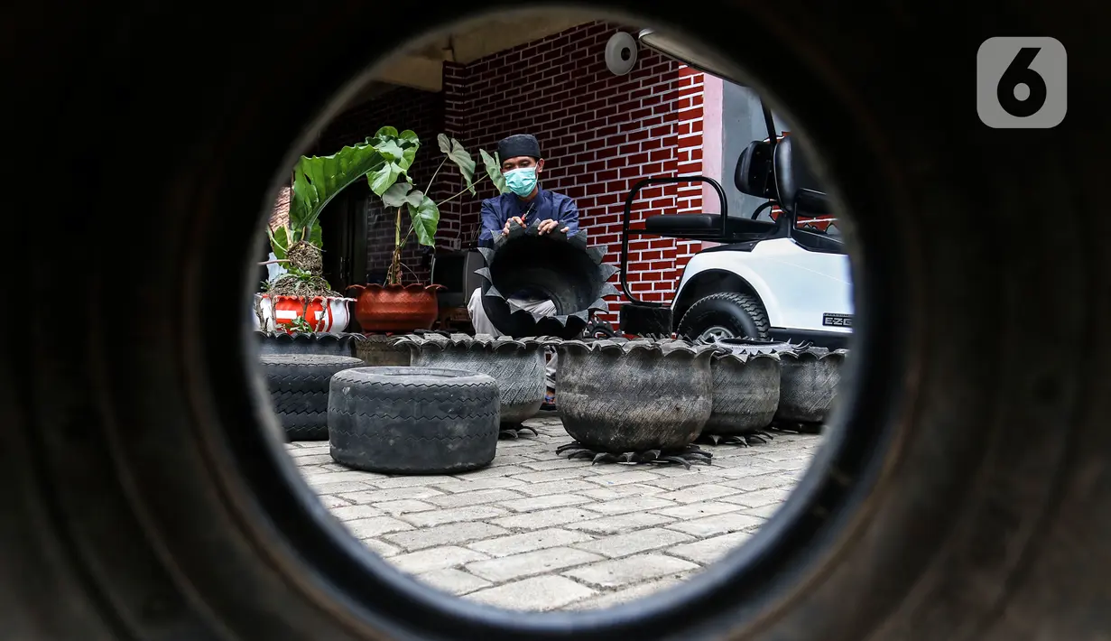 FOTO: Ban Bekas Disulap Jadi Pot Bunga Cantik - Foto Liputan6.com