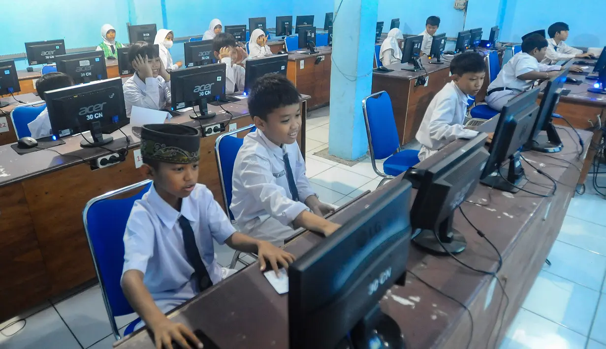 Antusiasme Pelajar Sekolah Dasar Ikuti Asesmen Nasional Berbasis Komputer - Foto Liputan6.com