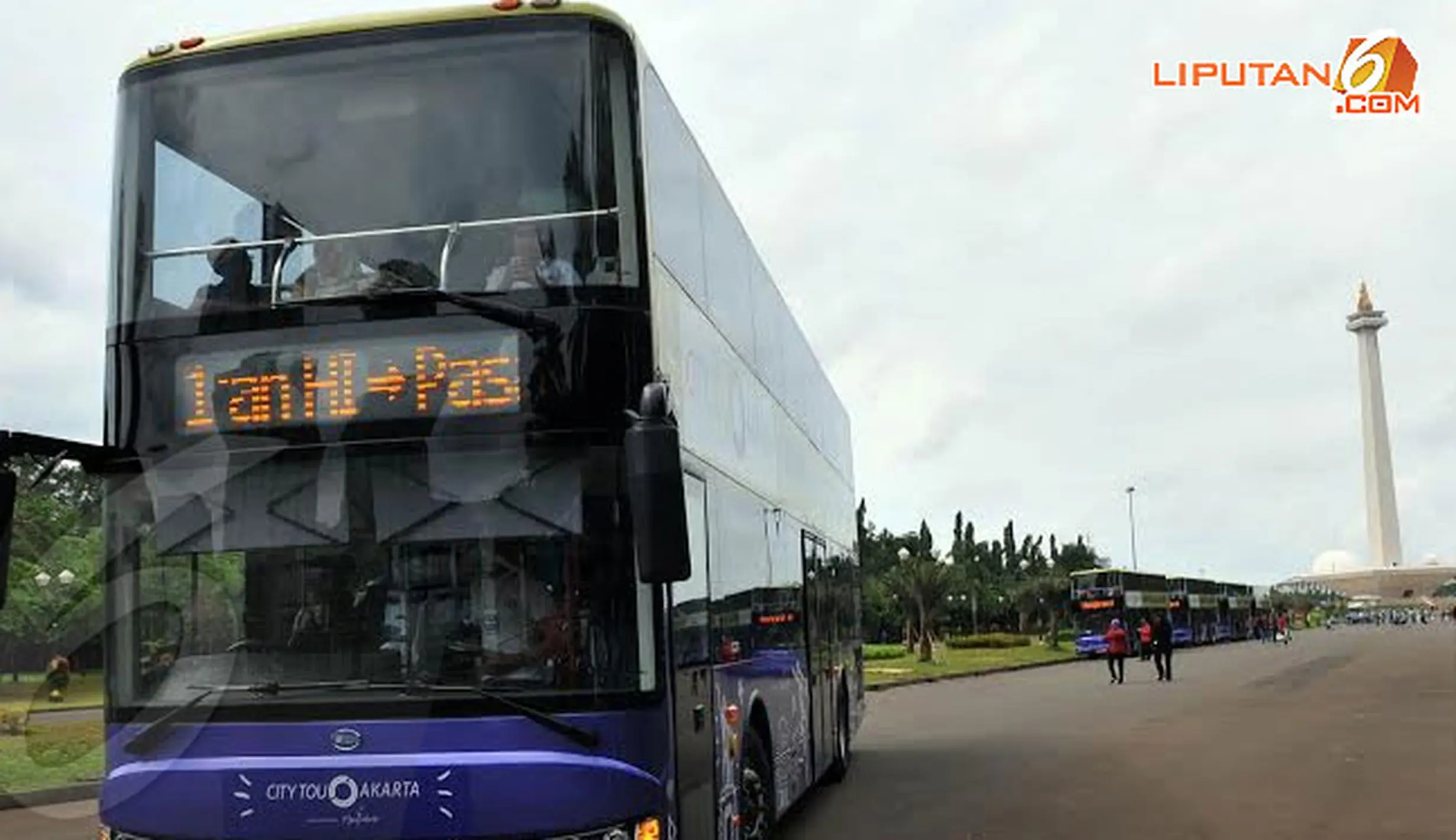 [FOTO] Bus Pariwisata Jakarta Mulai Beroperasi - Foto Liputan6.com