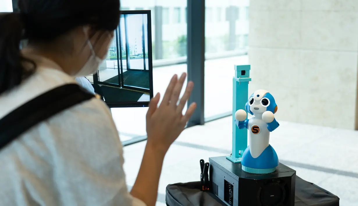 FOTO: Melihat Cara Kerja Robot-Robot Pemandu di Tokyo - Foto Liputan6.com