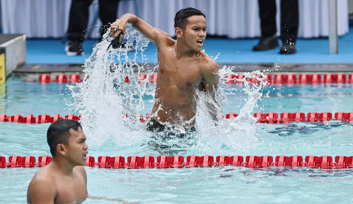 Aksi dan Ekspresi Peraih Medali Emas Peparnas XVII - Foto Liputan6.com