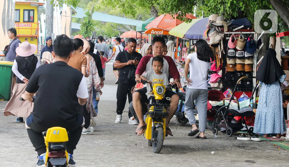 Pantai Lagoon Ancol Masih Jadi Lokasi Favorit Warga Habiskan Libur Panjang - Foto Liputan6.com