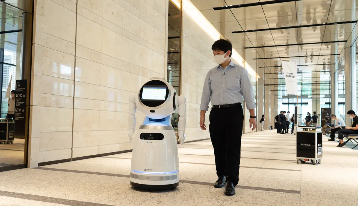 FOTO: Melihat Cara Kerja Robot-Robot Pemandu di Tokyo - Foto Liputan6.com