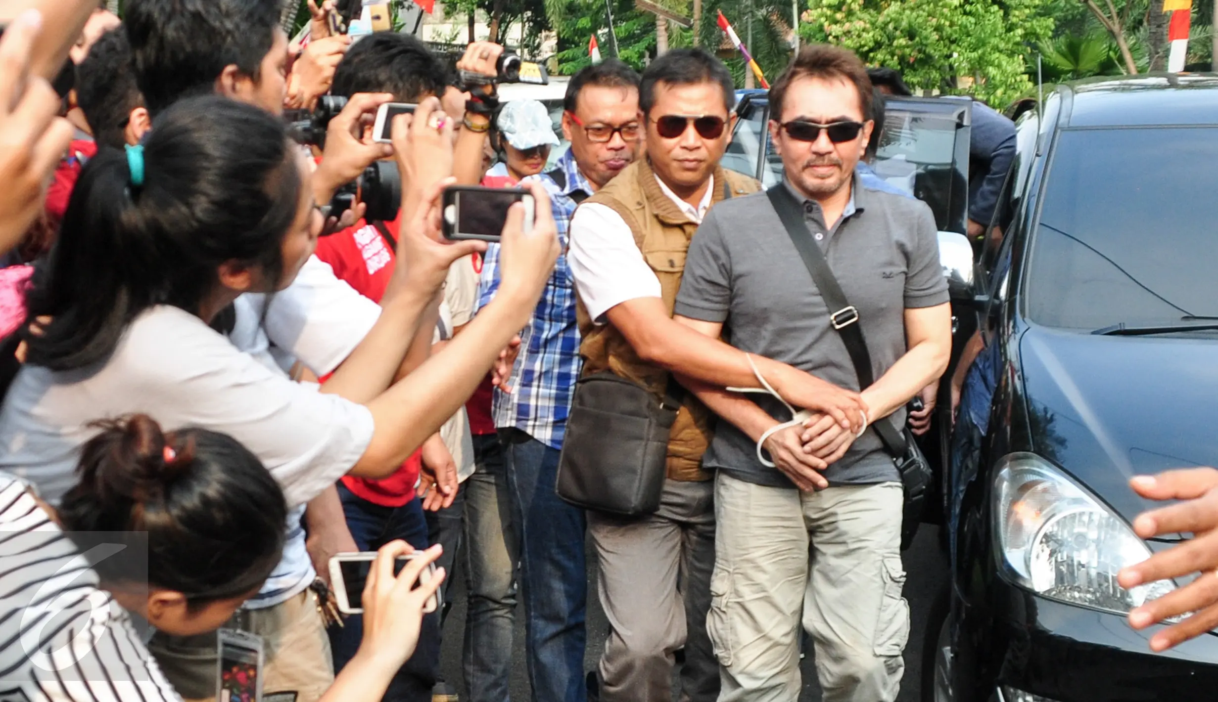 Lengkapi Barang Bukti, Polisi Geledah Rumah Aa Gatot - Foto Liputan6.com