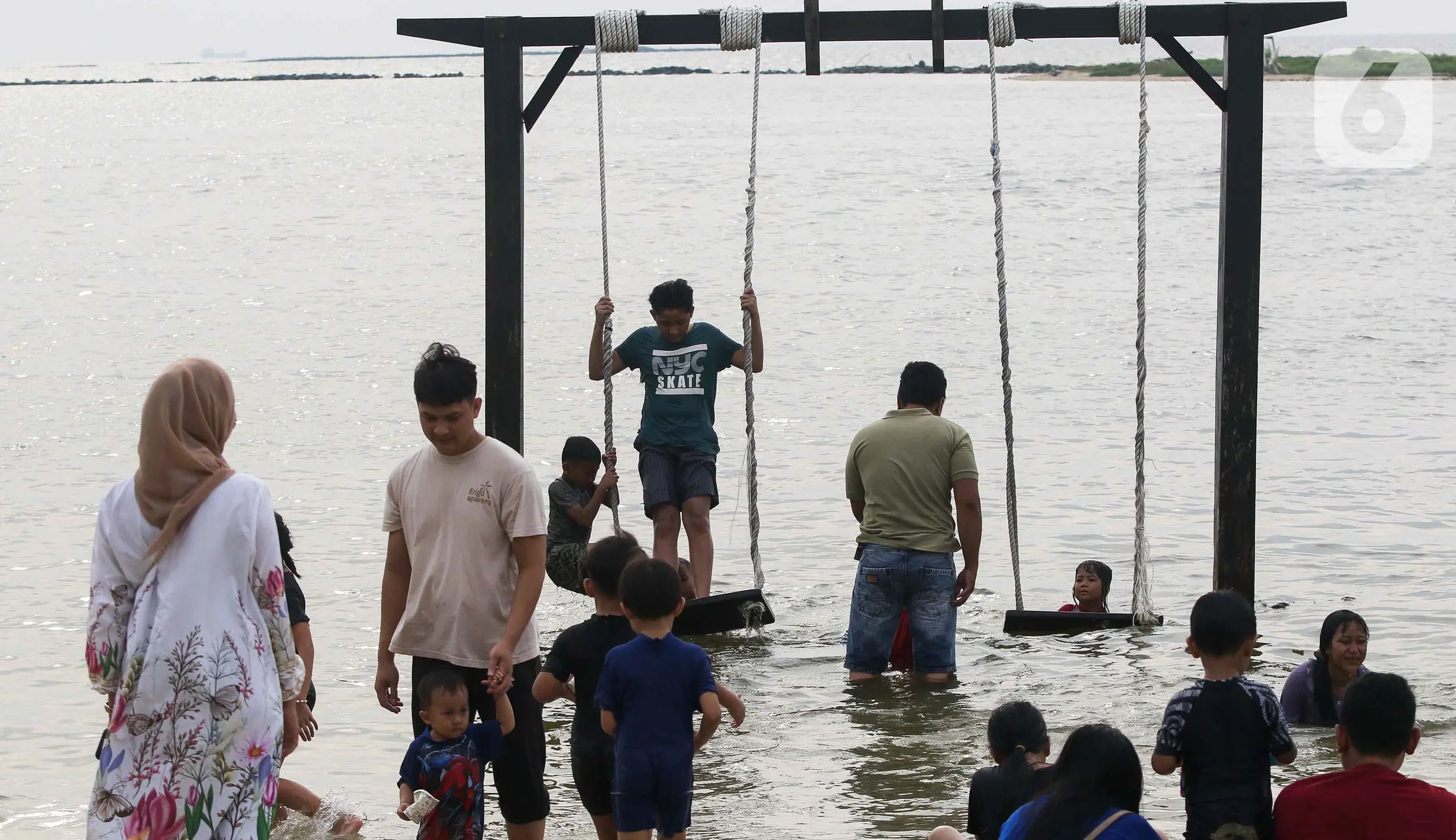 Pantai Lagoon Ancol Masih Jadi Lokasi Favorit Warga Habiskan Libur Panjang - Foto Liputan6.com
