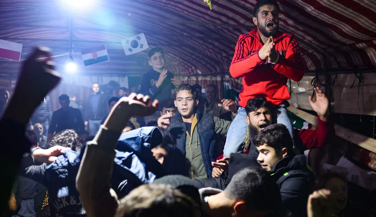 Potret Pengungsi Suriah Saksikan Piala Dunia 2022 Qatar - Foto Liputan6.com