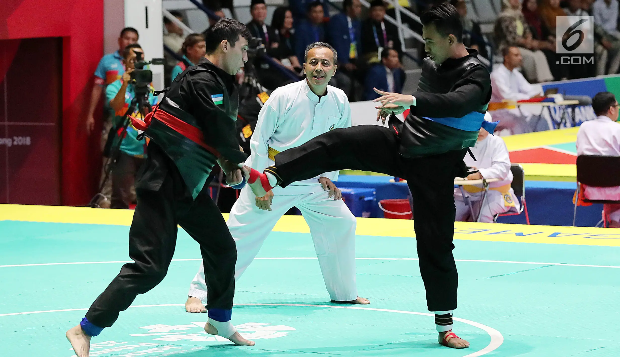FOTO : Dua Pesilat Indonesia Masuk Delapan Besar - Foto Liputan6.com