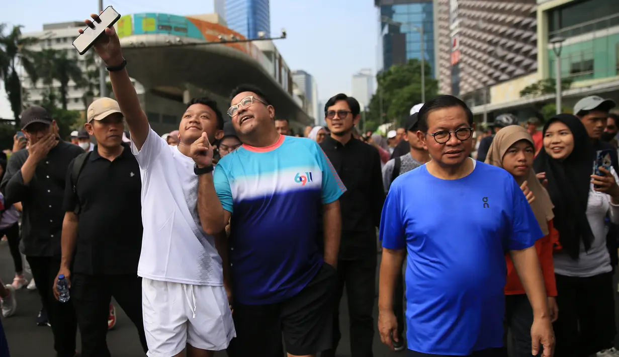 Berolahraga Saat CFD, Pramono Anung-Rano Karno Sapa Warga Jakarta ...