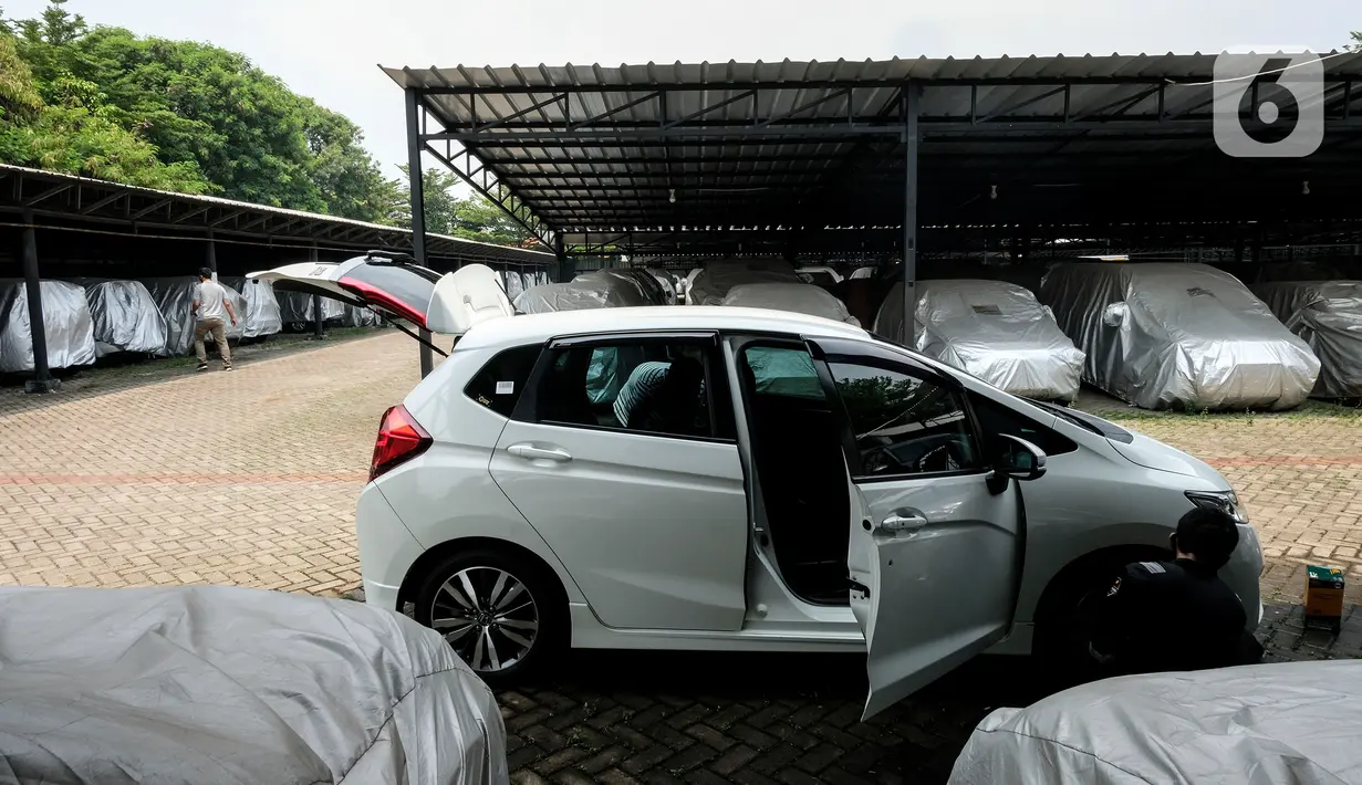FOTO: Gadai Mobil Meningkat Sejak Pandemi - Foto Liputan6.com