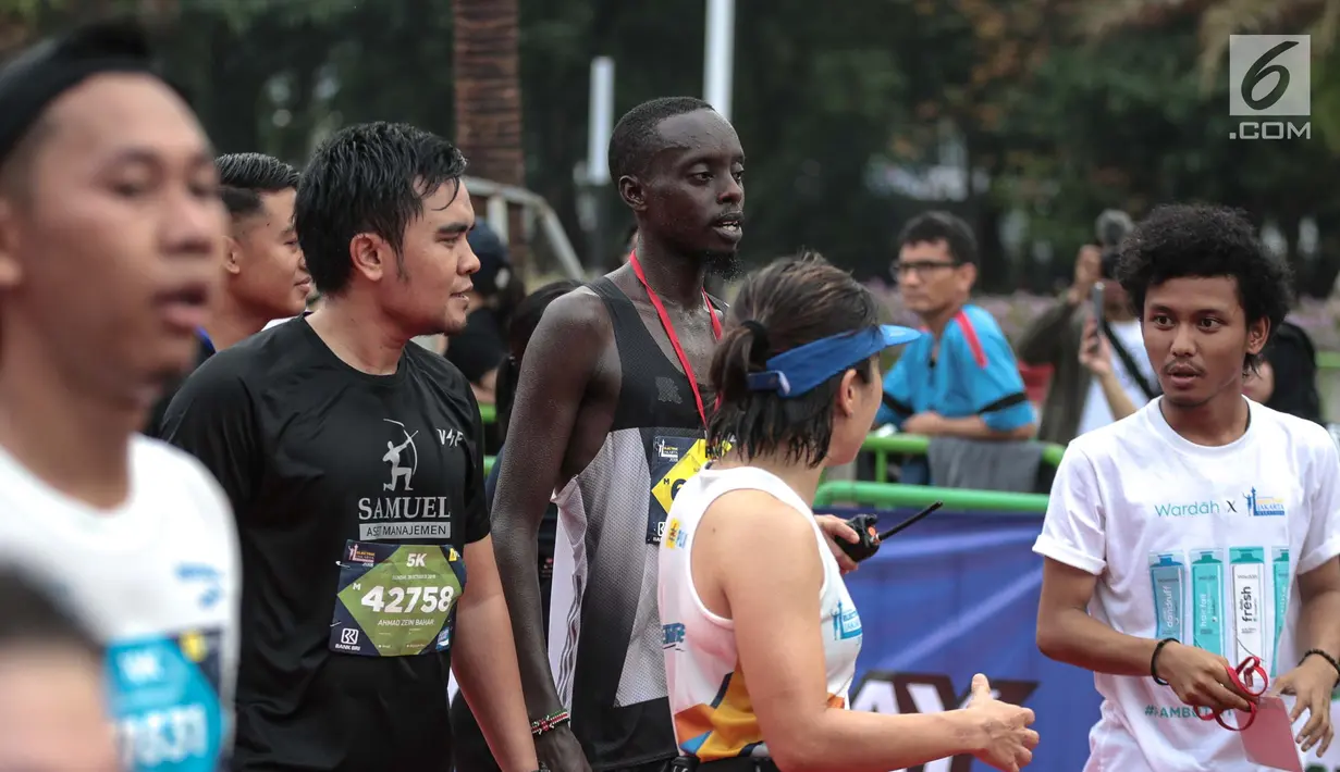FOTO: Gaya Pelari Kenya Usai Ikuti Jakarta Marathon 2018 - Foto Liputan6.com