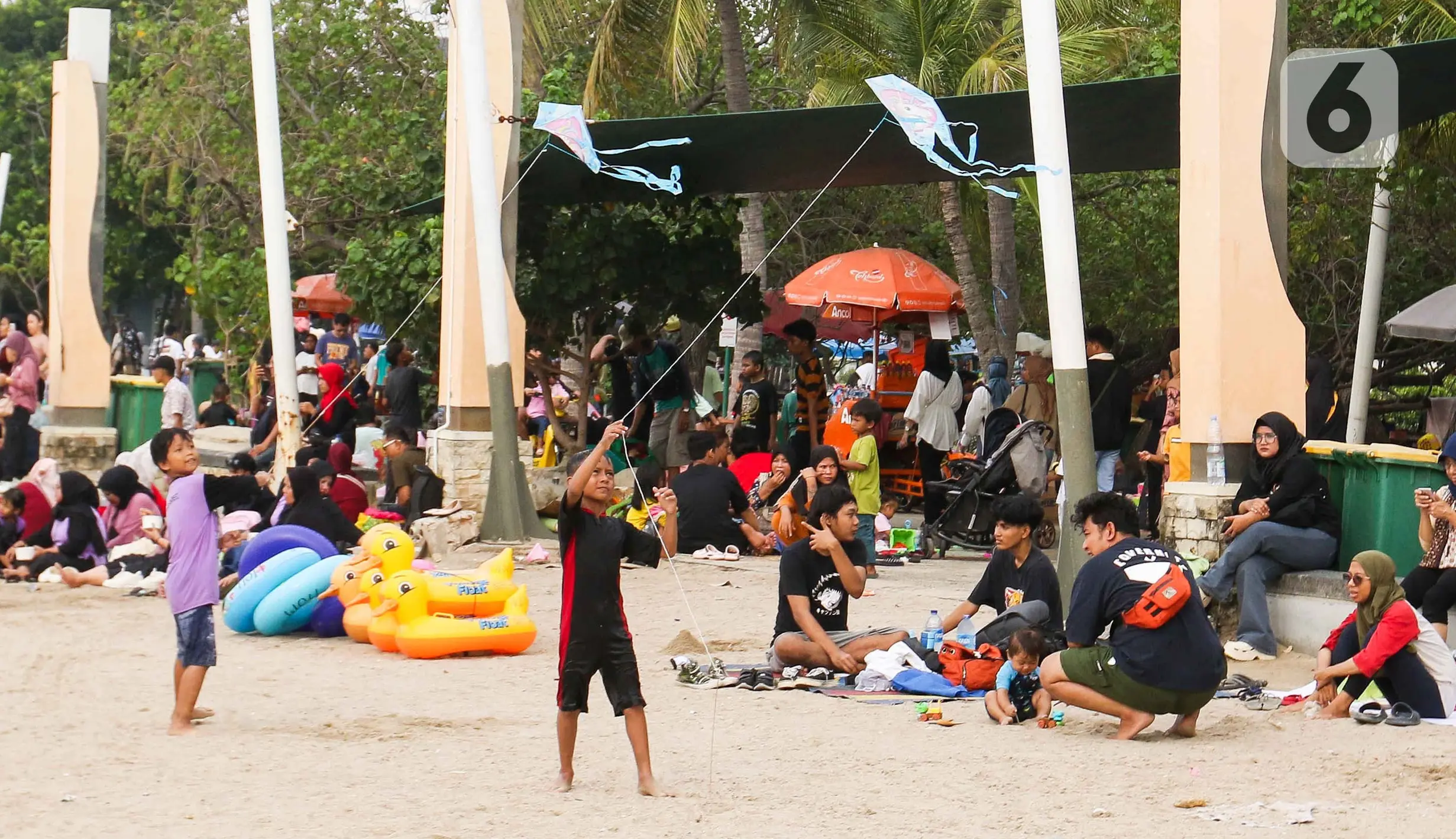 Pantai Lagoon Ancol Masih Jadi Lokasi Favorit Warga Habiskan Libur Panjang - Foto Liputan6.com