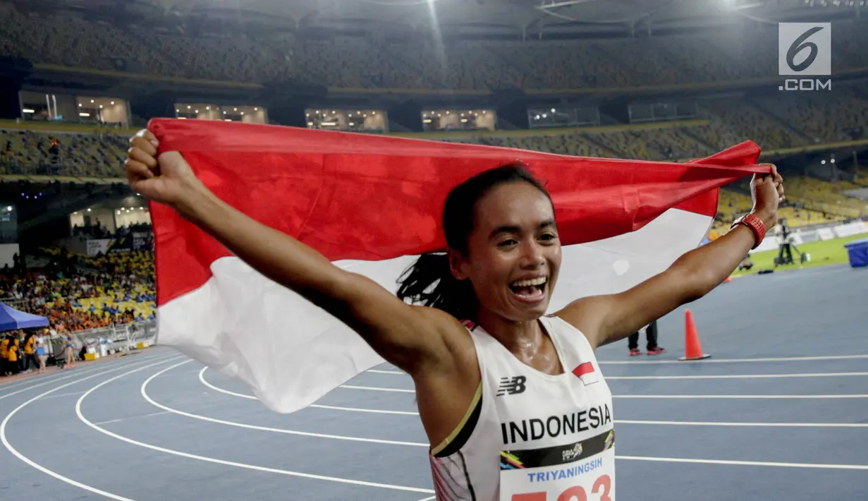 PHOTO: Pelari Triyaningsih Sumbang Emas Untuk Indonesia - Foto Liputan6.com