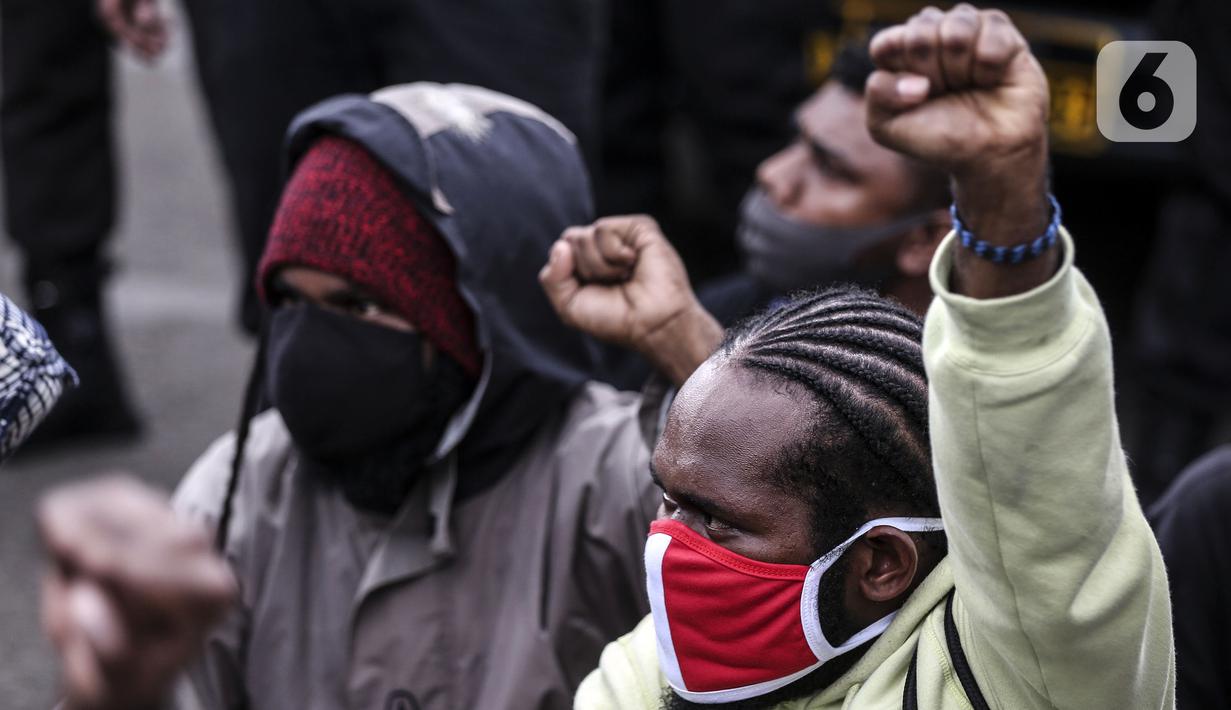 FOTO: Peringati Operasi Trikora, Masyarakat Papua Tuntut Penghentian ...