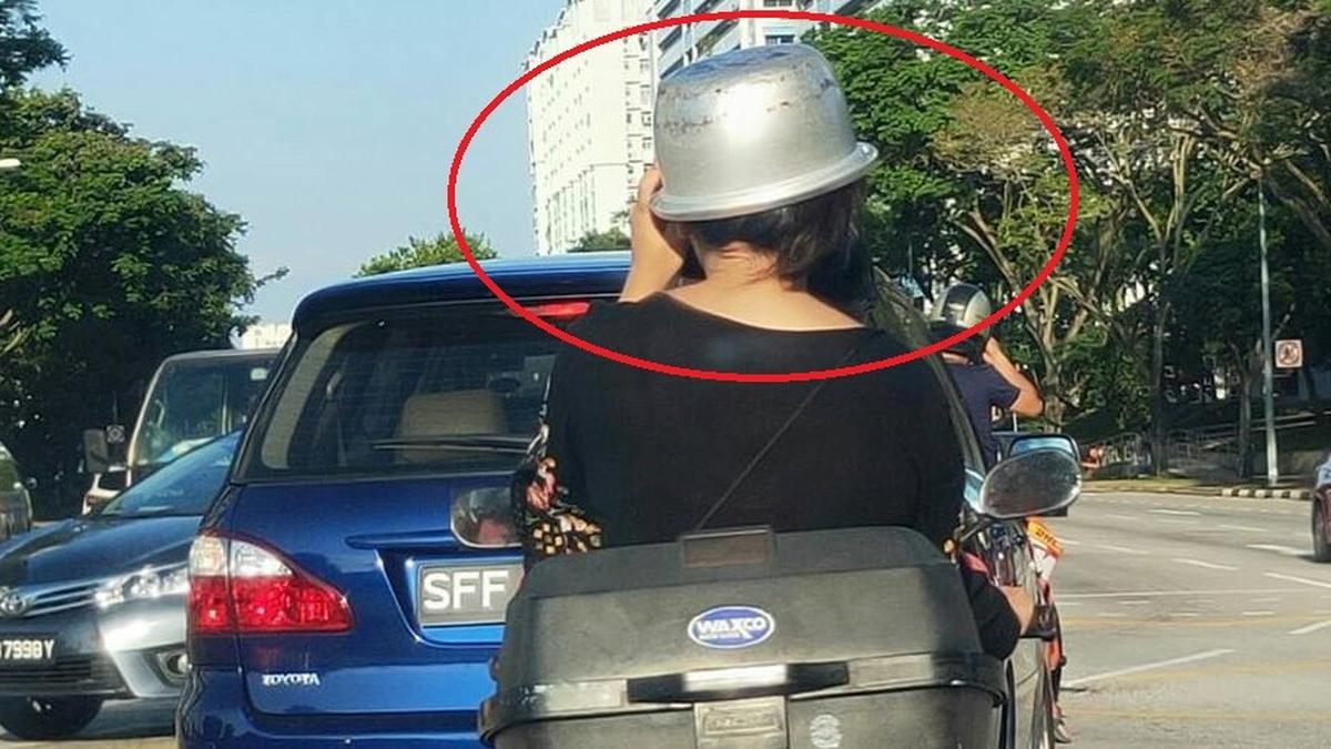 Konyol, Wanita Ini Gunakan Panci sebagai Pengganti Helm