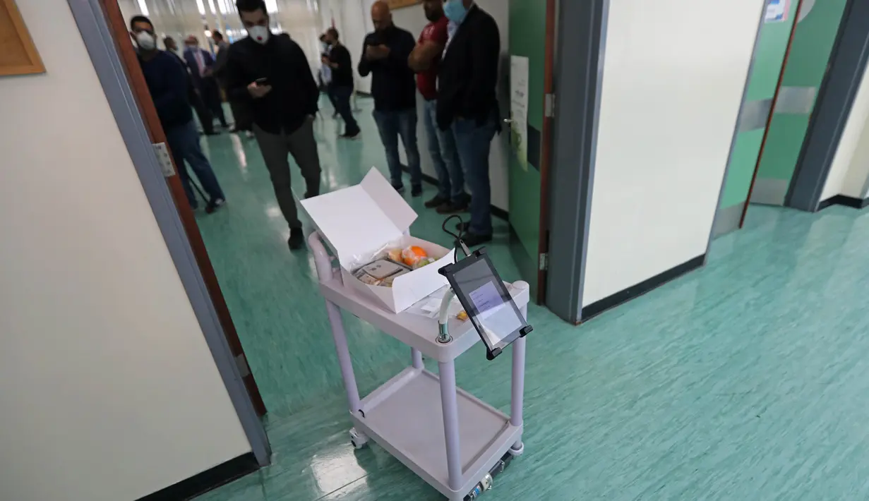 FOTO: Troli Robot Bantu Tangani Pasien Covid-19 - Foto Liputan6.com