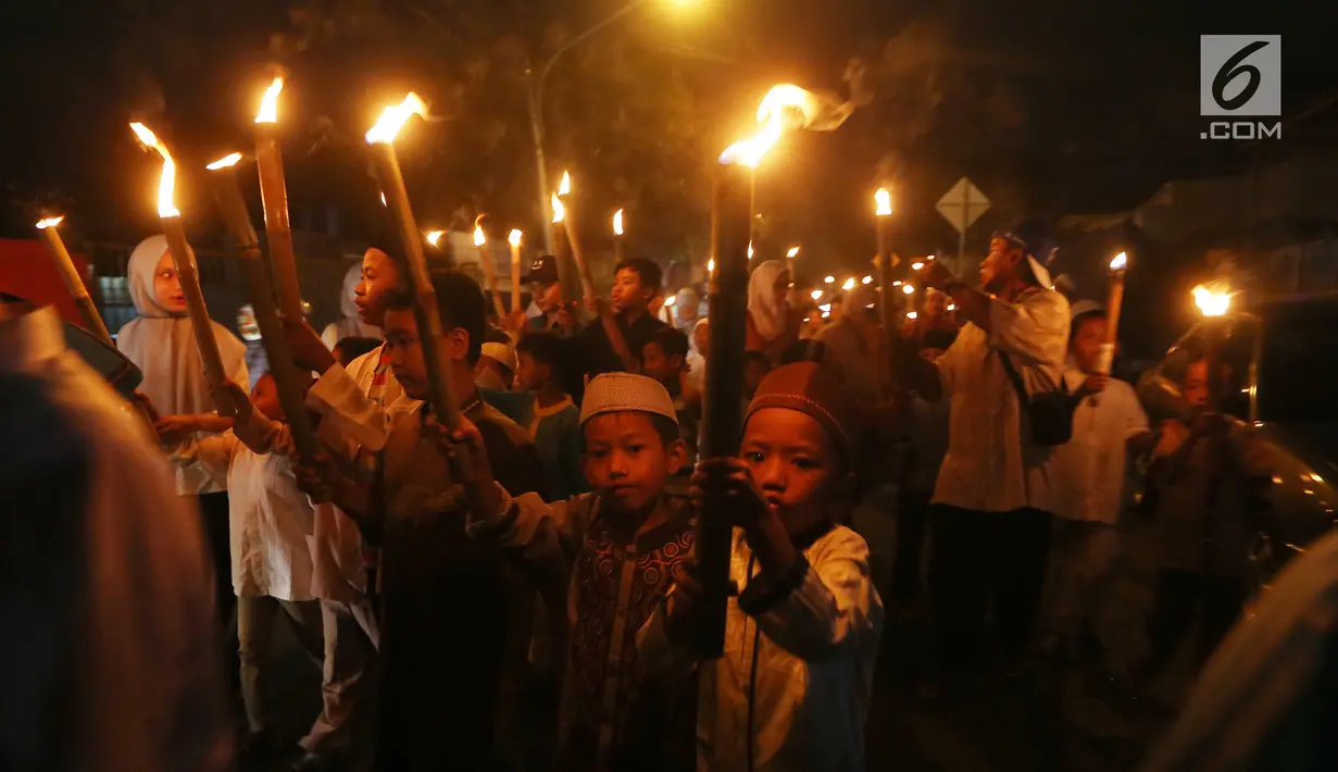 Pawai Obor Warnai Takbir Idul Fitri di Jakarta - Foto Liputan6.com