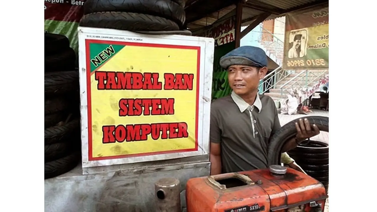 6 Spanduk Kocak Tukang Tambal Ban Ini Bikin Ketawa - Hot Liputan6.com