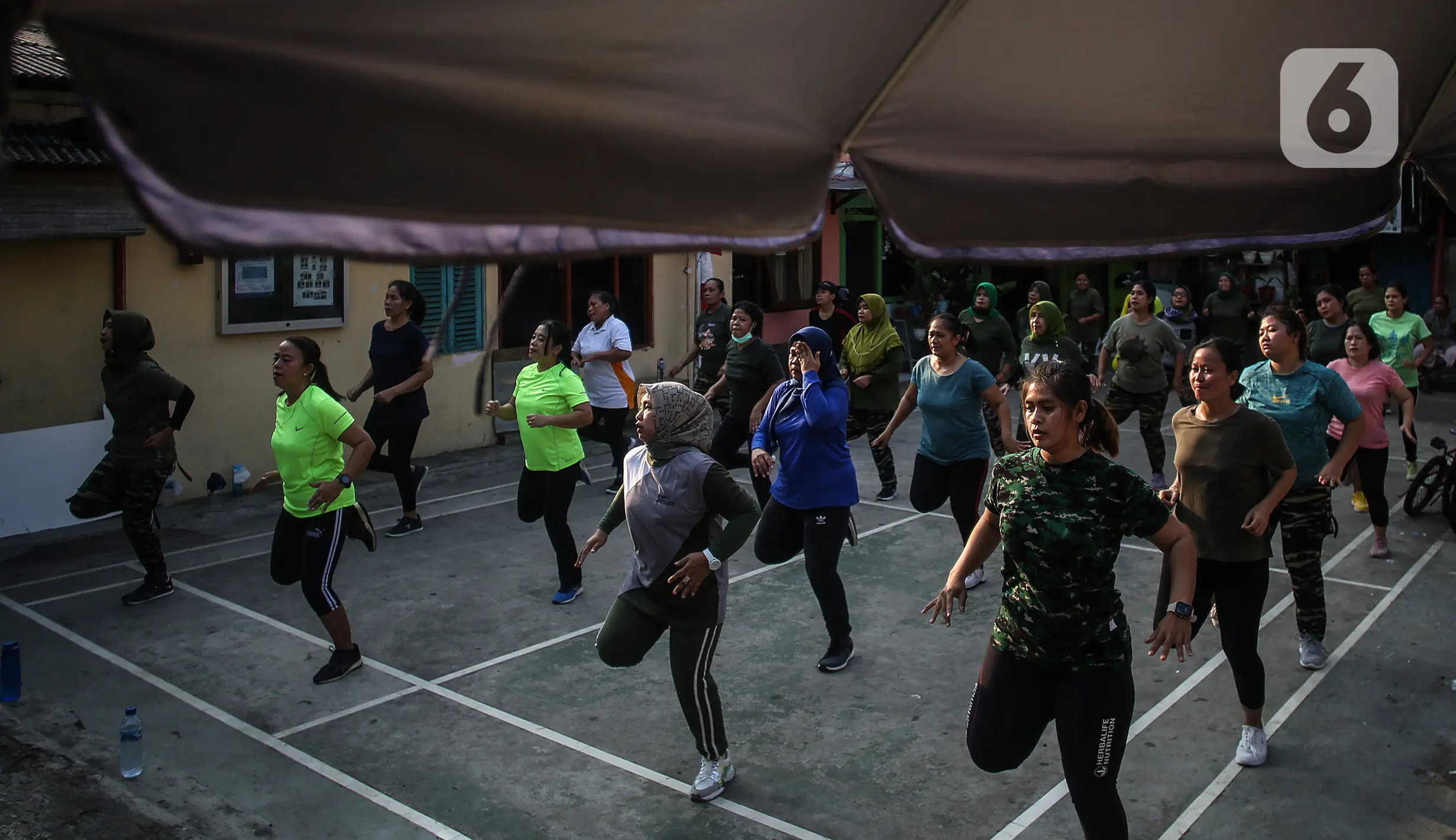 FOTO: Senam Bersama untuk Kesehatan Tubuh - Foto Liputan6.com