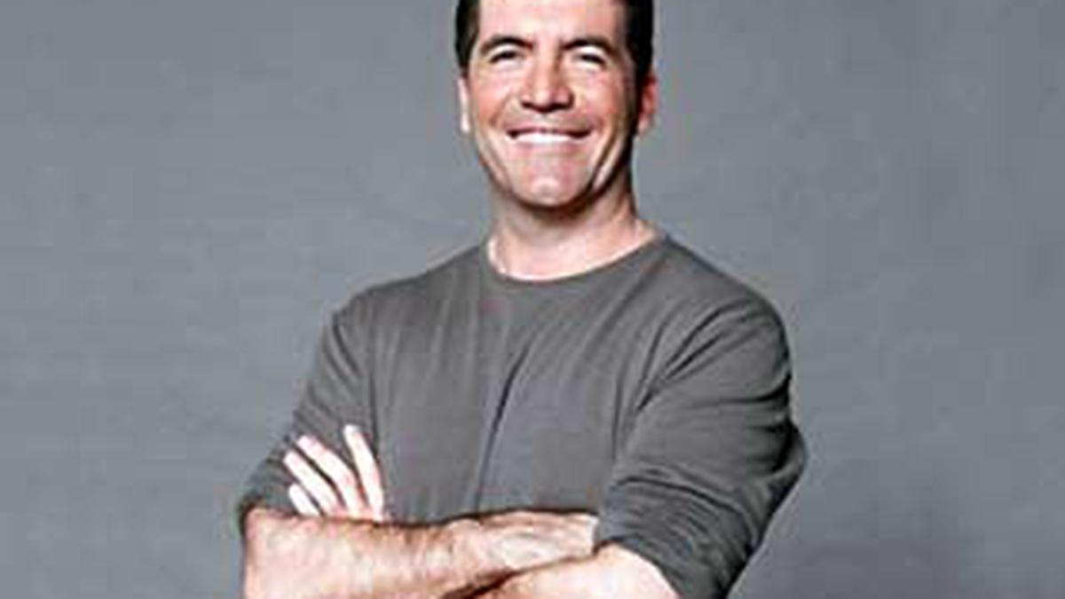 Simon Cowell Rekam Lagu Amal Haiti - ShowBiz Liputan6.com