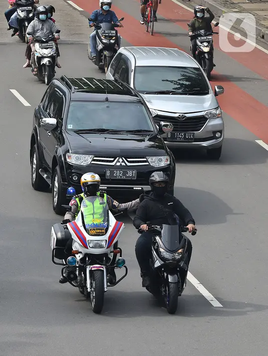FOTO: Razia Motor Berknalpot Bising di Kawasan Monas - Foto Liputan6.com