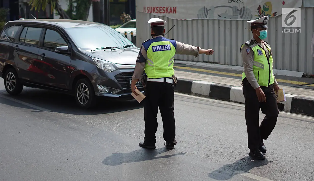 FOTO: Pengemudi di Jaksel Kena Tilang Hari Pertama Perluasan Ganjil ...