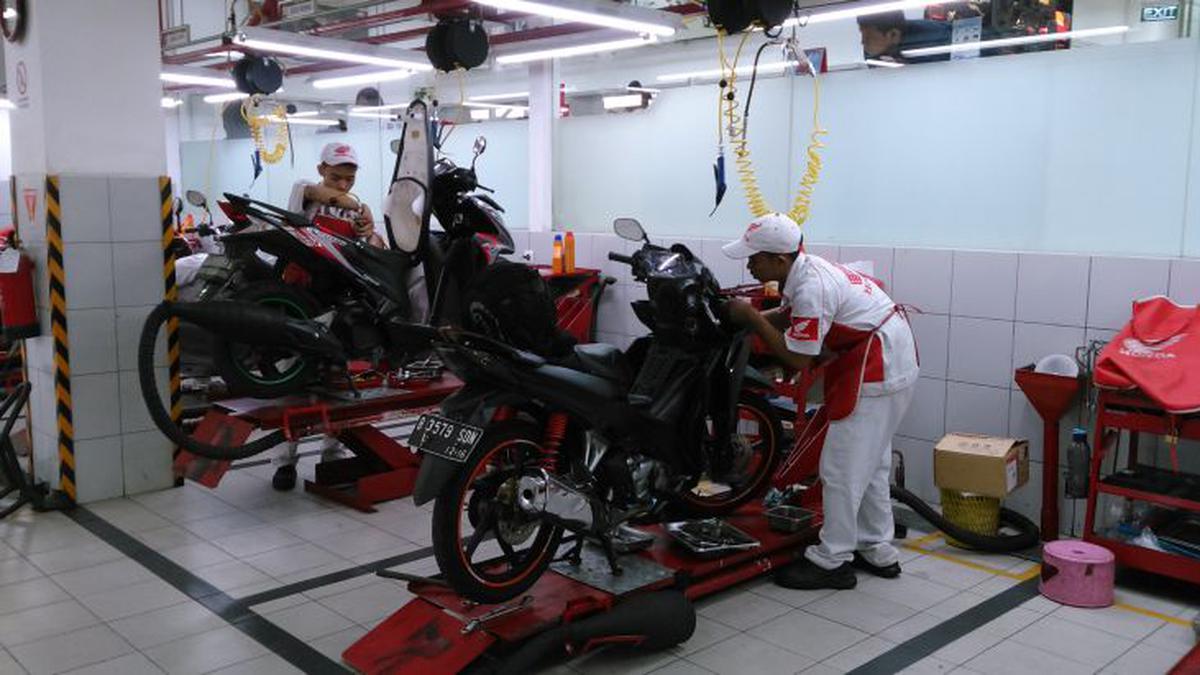 Membandingkan Ongkos Servis Injeksi dan Karburator - Otomotif Liputan6.com