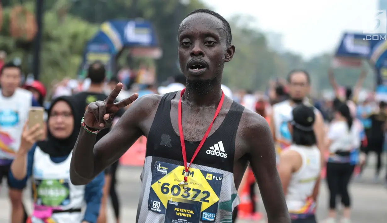 FOTO: Gaya Pelari Kenya Usai Ikuti Jakarta Marathon 2018 - Foto Liputan6.com