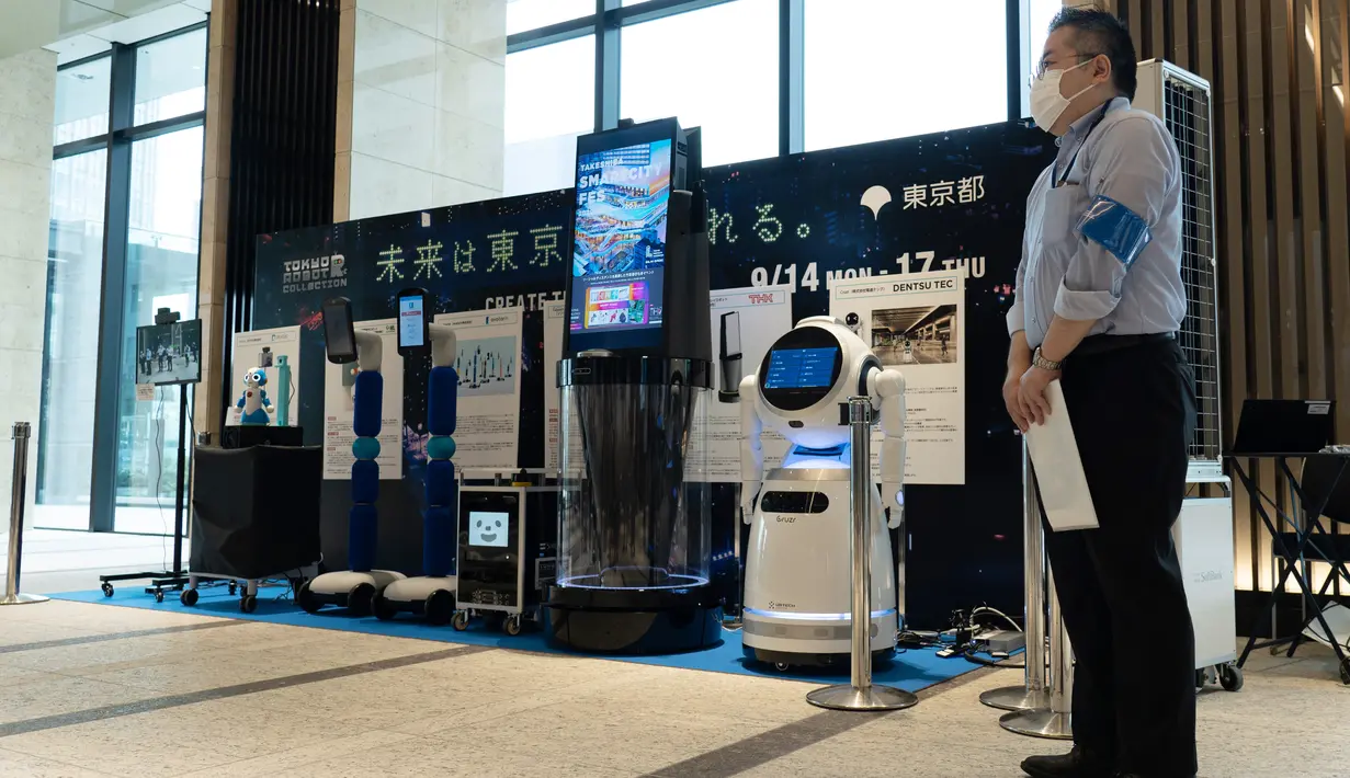 FOTO: Melihat Cara Kerja Robot-Robot Pemandu di Tokyo - Foto Liputan6.com