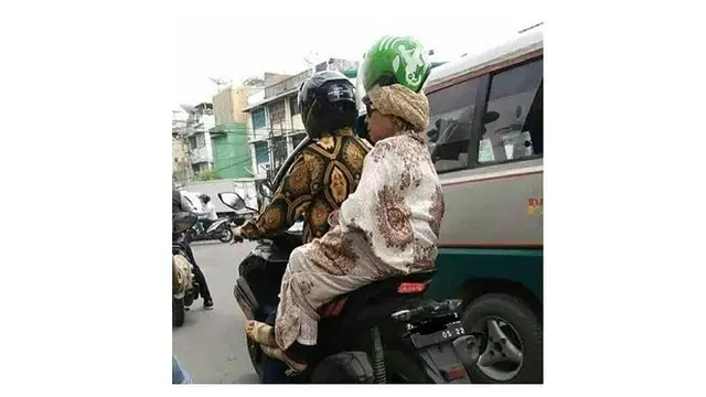 6 Potret Emak-Emak Pakai Helm Ketinggian karena Cepolan Rambut Ini Kocak - Hot Liputan6.com