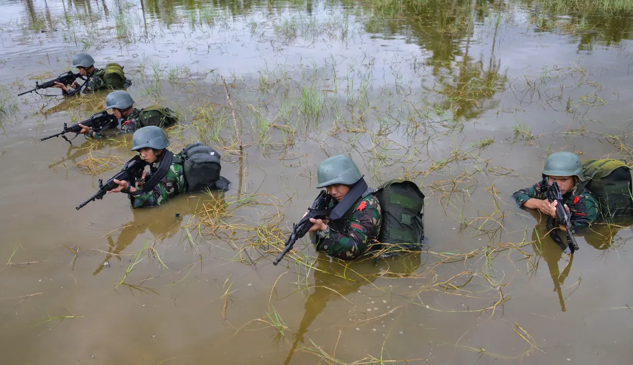 FOTO: Aksi Pasukan Elite TNI dalam Latihan Perang Gerilya - Foto Liputan6.com