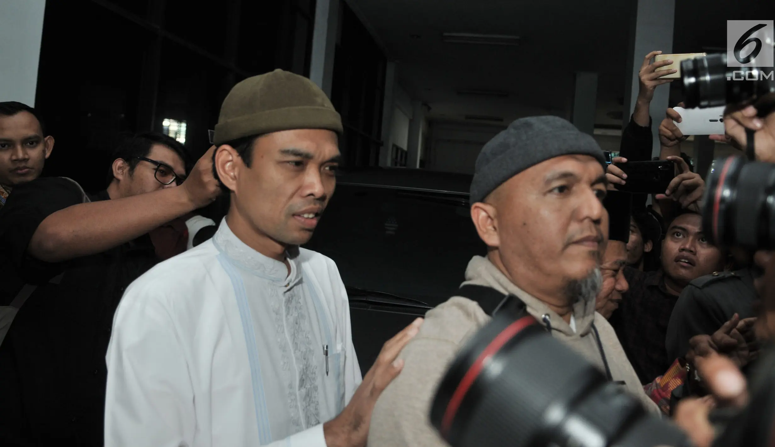 FOTO: Ekspresi Ustaz Abdul Somad Penuhi Undangan MUI - Foto Liputan6.com