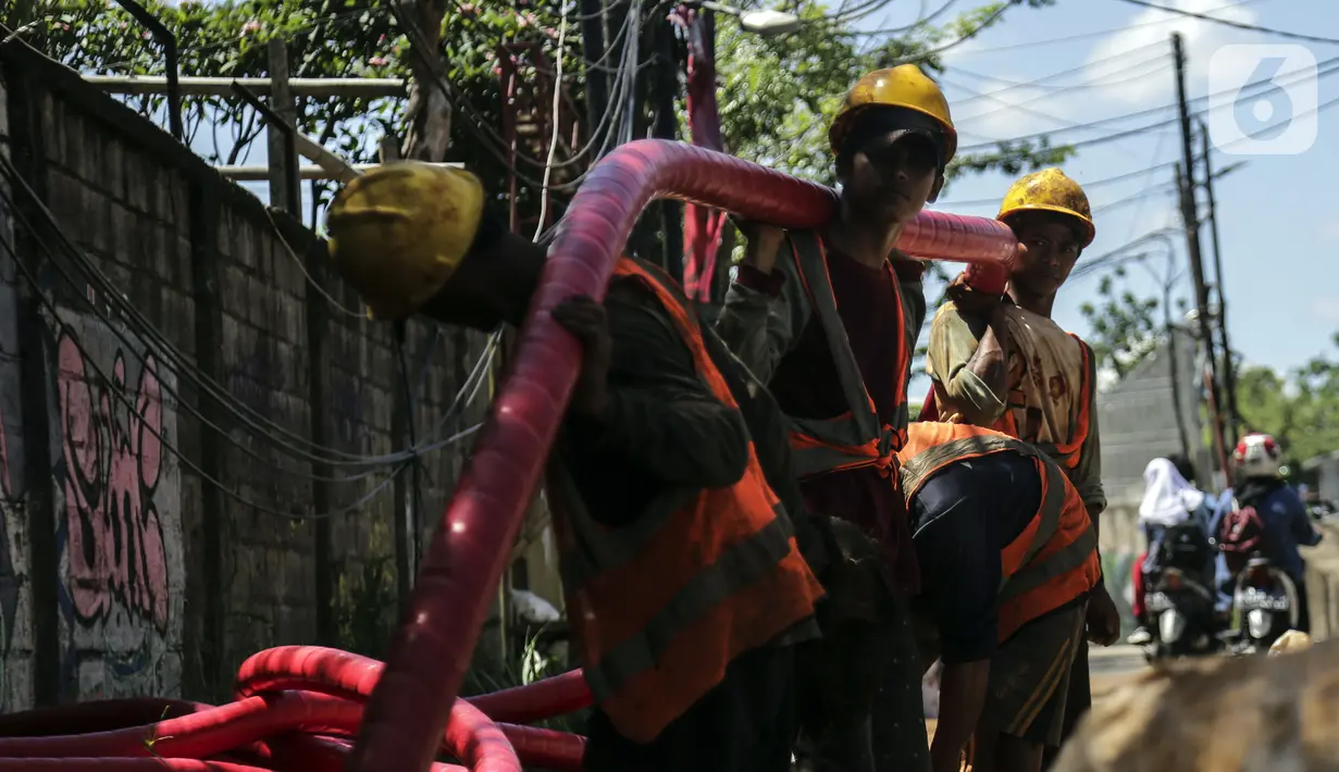 FOTO: Program Bantuan Pemerintah untuk Pekerja Informal - Foto Liputan6.com