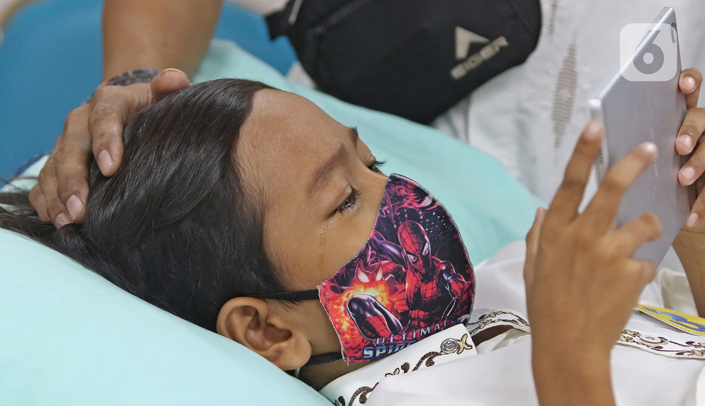 FOTO: Sunatan Massal Peringati Hari Kesehatan Nasional - Foto Liputan6.com