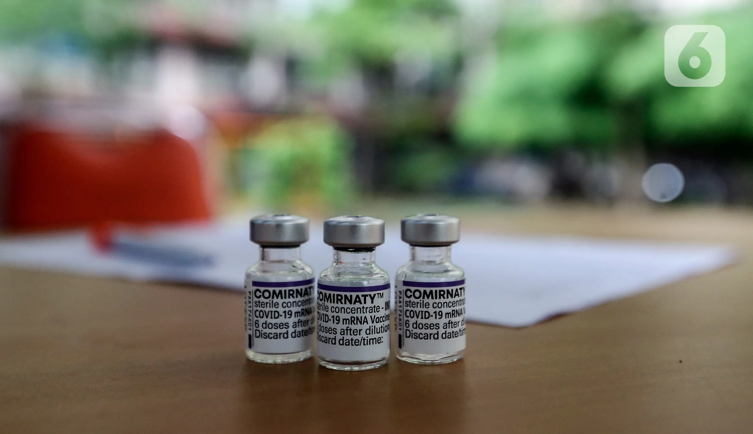 FOTO: Vaksin Booster Jadi Syarat Kegiatan Masyarakat - Foto Liputan6.com