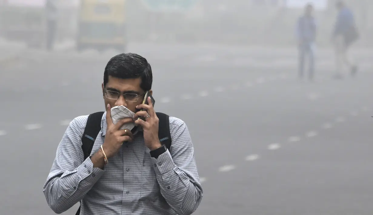 PHOTO: Kabut Asap Terparah Sesaki Ibu Kota India - Foto Liputan6.com