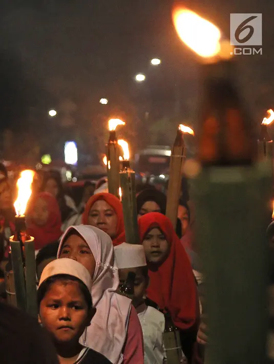 FOTO: Pawai Obor Sambut Bulan Suci Ramadan 1439 H - Foto Liputan6.com