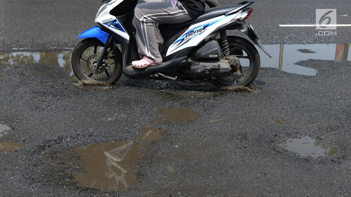 Ini Komponen yang Rawan Rusak Jika Motor Sering Menghantam Lubang