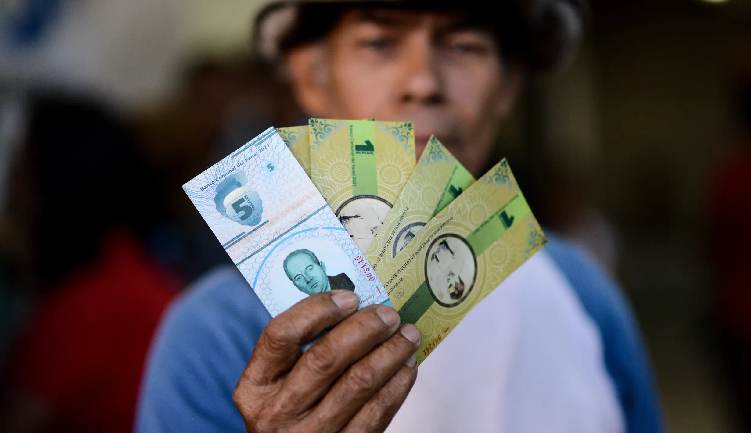 PHOTO: Inflasi Parah di Venezuela, Masyarakat Lokal Ciptakan Mata Uang ...