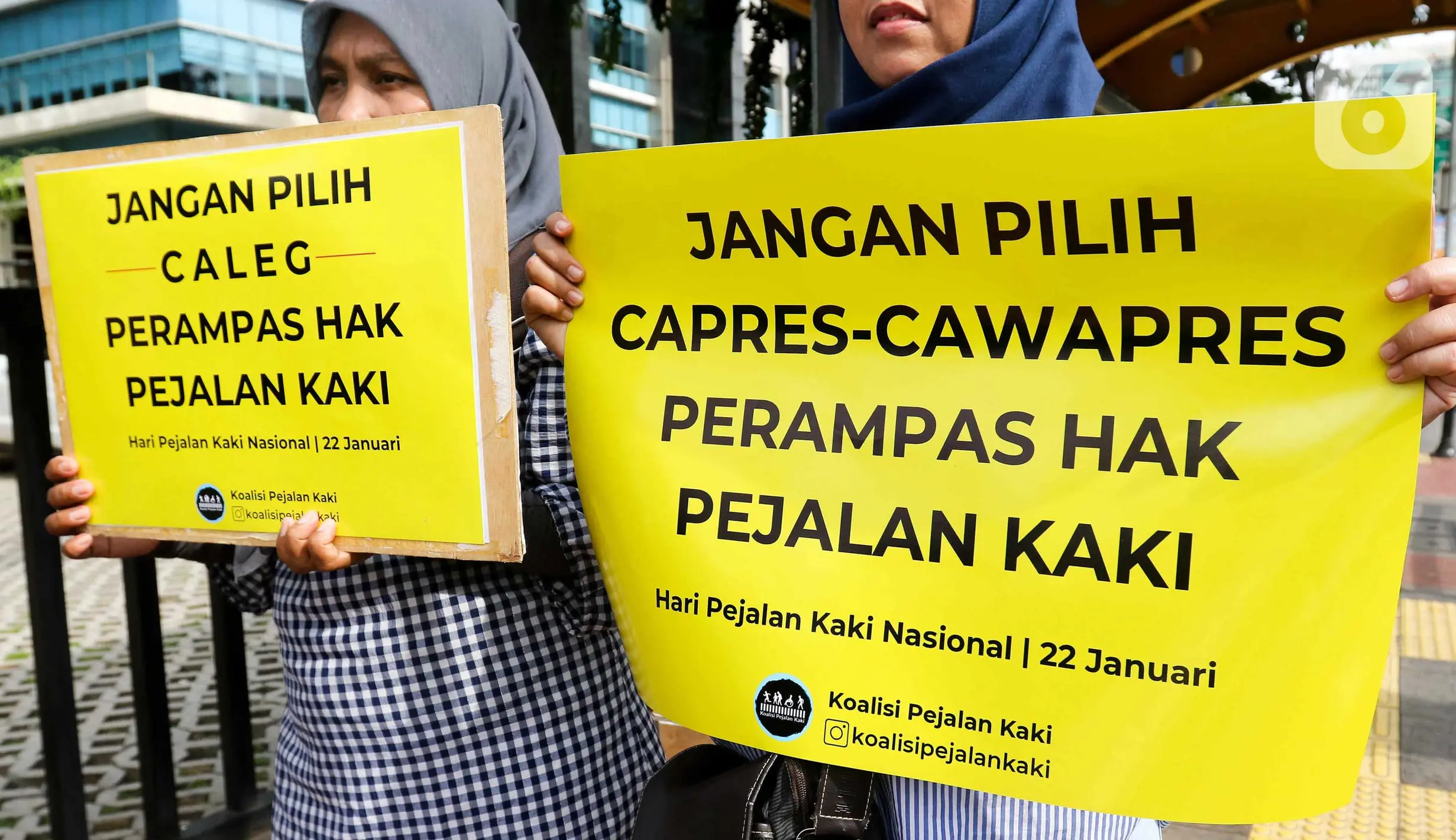 Potret Aktivis saat Peringati Hari Pejalan Kaki Nasional - Foto Liputan6.com