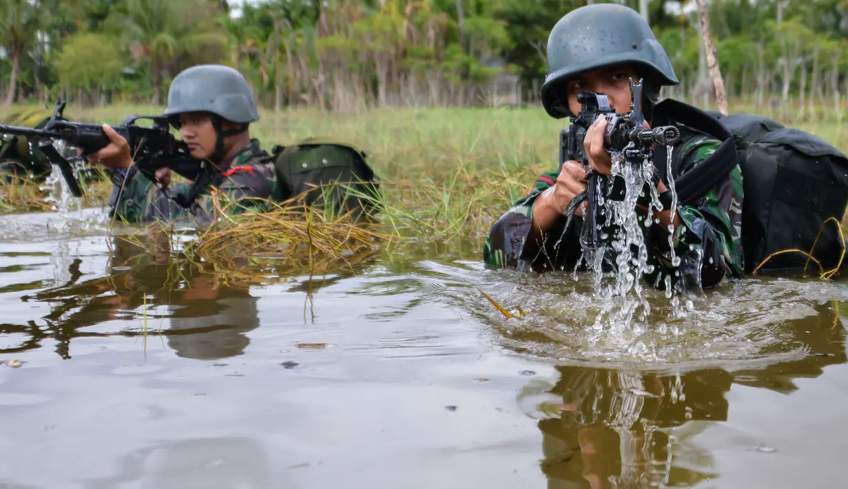 FOTO: Aksi Pasukan Elite TNI dalam Latihan Perang Gerilya - Foto Liputan6.com