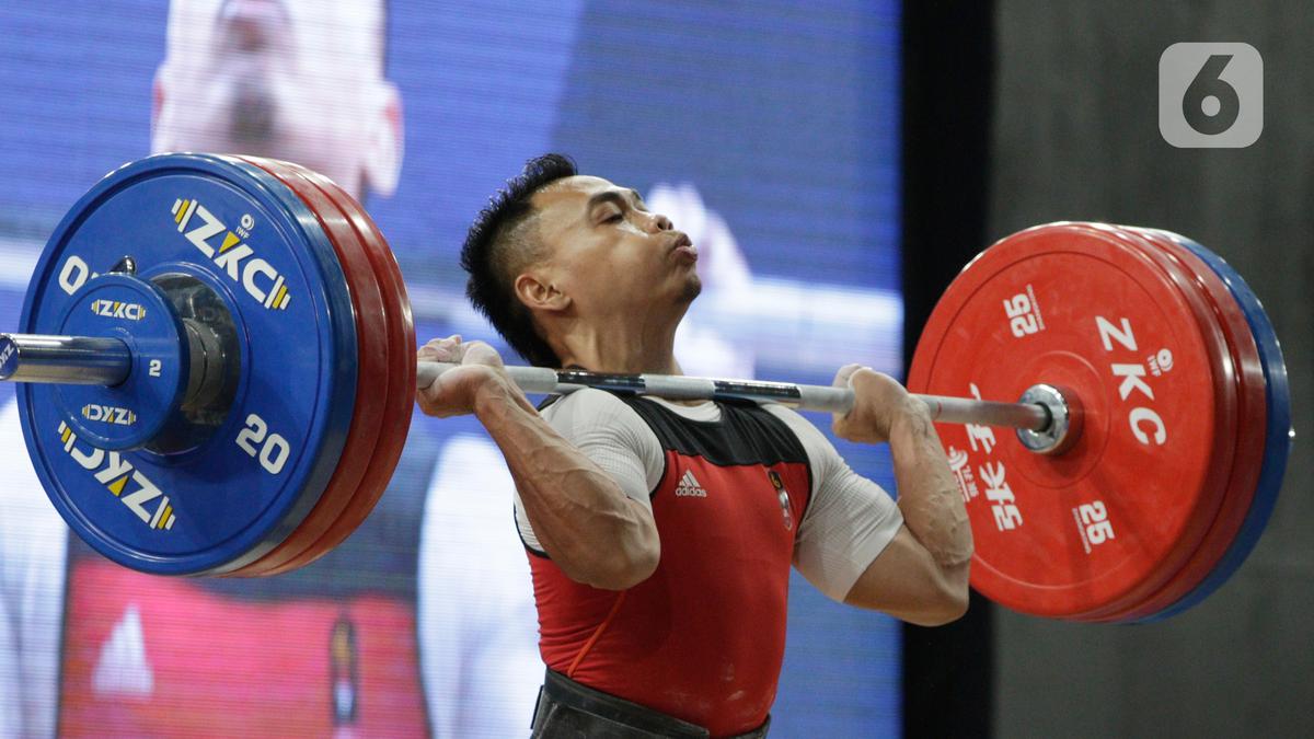 FOTO: Lifter Eko Yuli Sabet Medali Emas SEA Games 2019 - Foto Liputan6.com